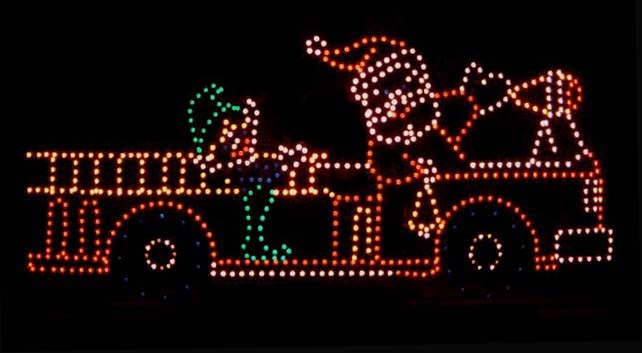 SANTA DRIVING A FIRE TRUCK - Creative Displays